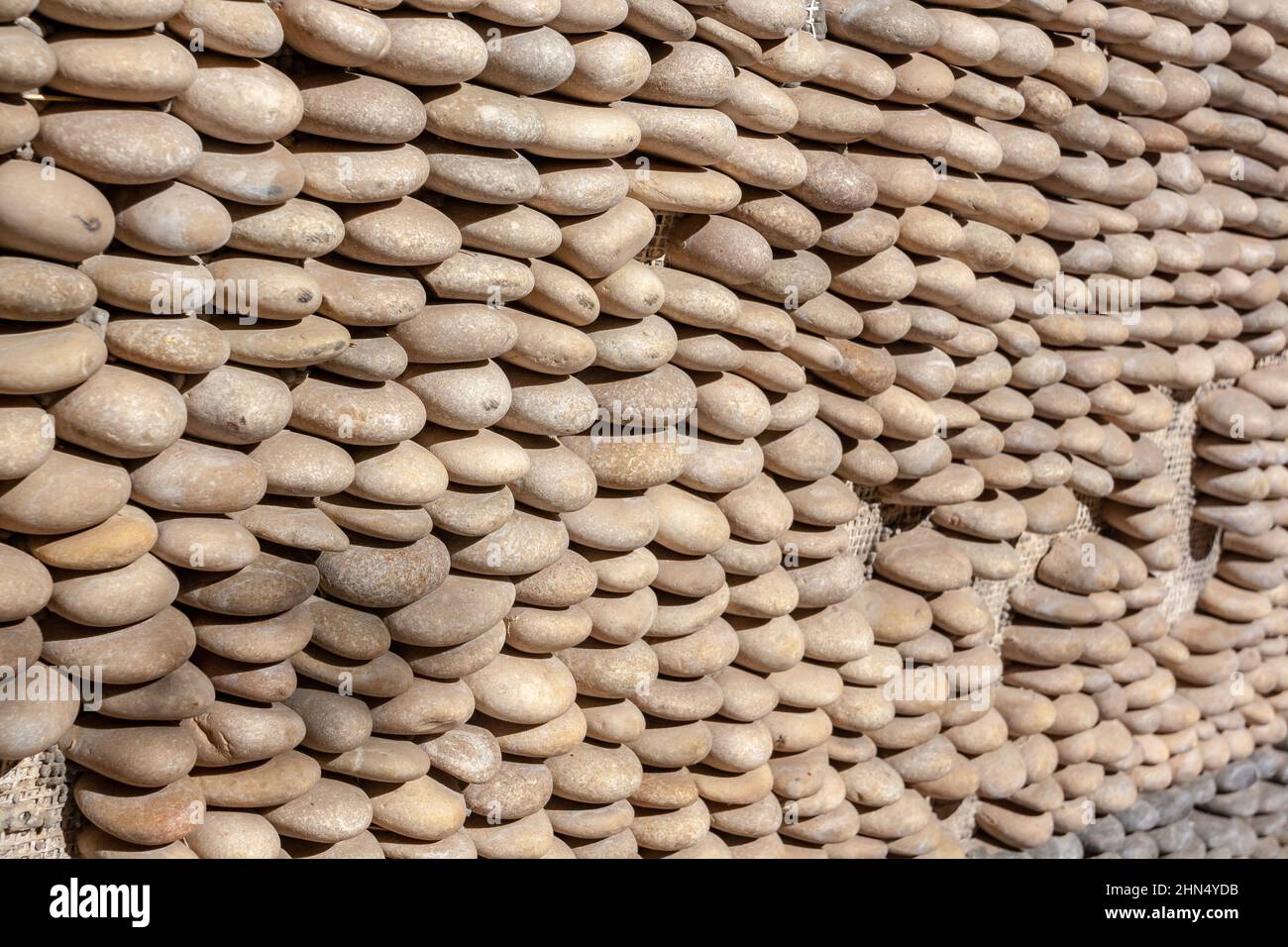 Wall is made of pebbles. Stone background. Horizontal Stock Photo - Alamy