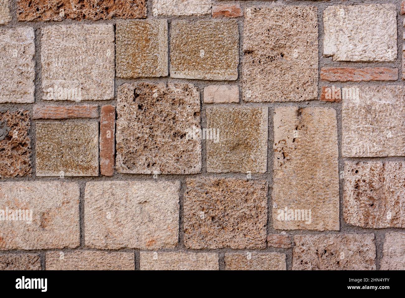 Antique masonry from blocks of different sizes and mortars Stock Photo ...