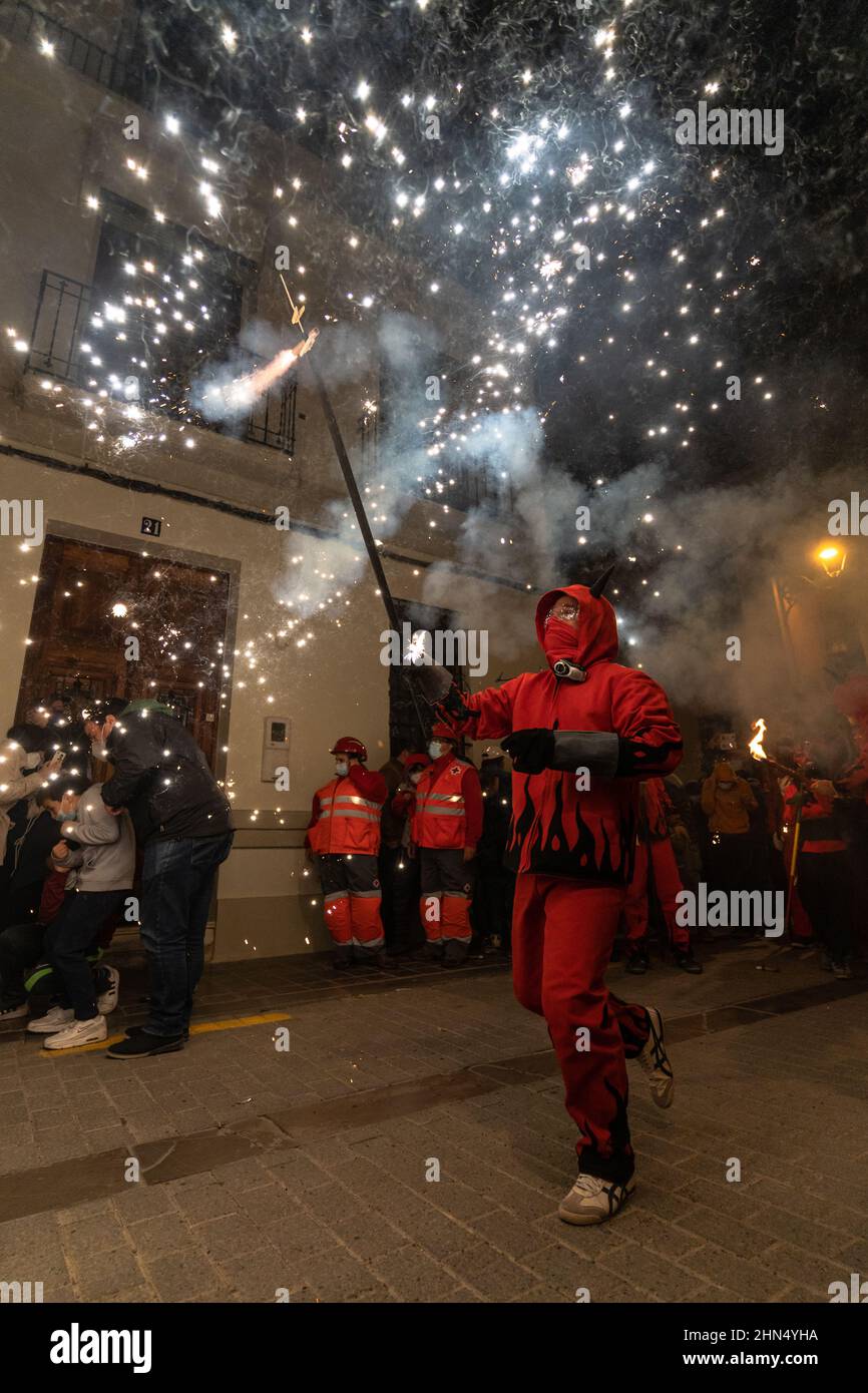 Valencia, Spain - 11 February, 2022: A man dressed as a demon with a ...