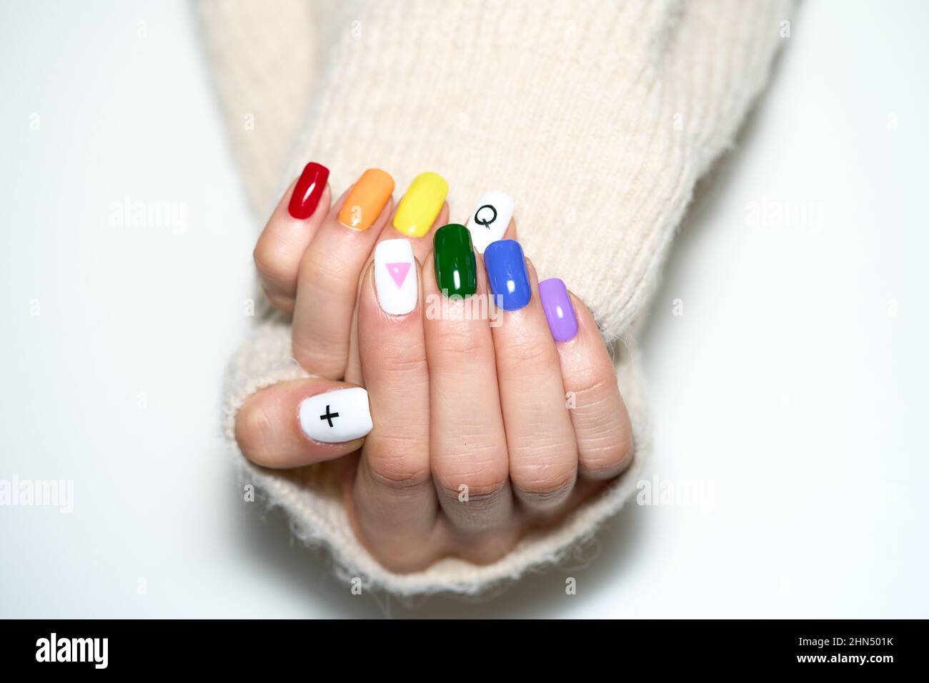 Hands With Lgbt Rainbow Flag And Rose Triangle Manicure Symbol Of