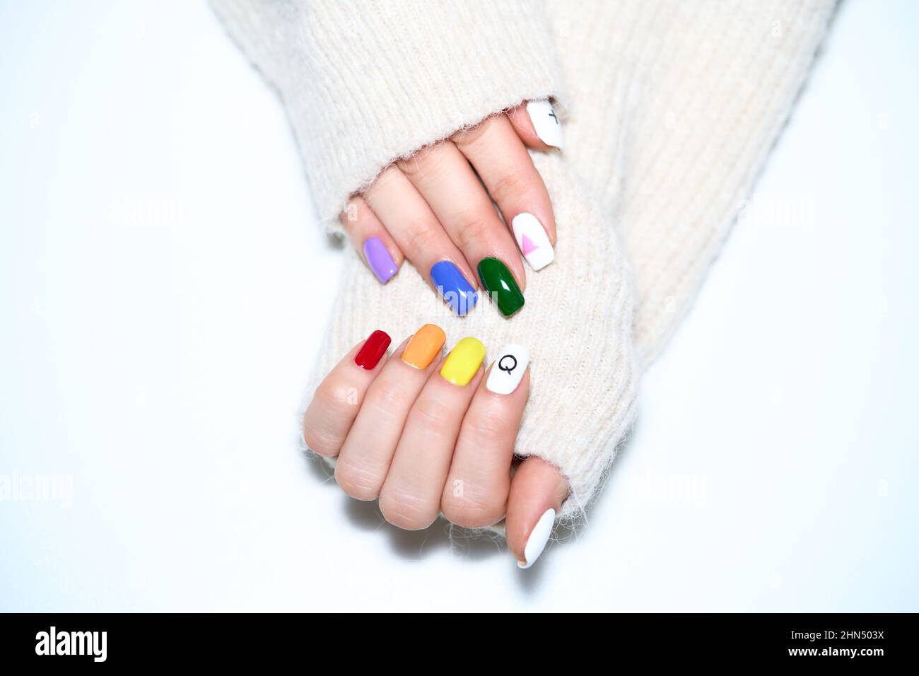 Hands With Lgbt Rainbow Flag And Rose Triangle Manicure Symbol Of
