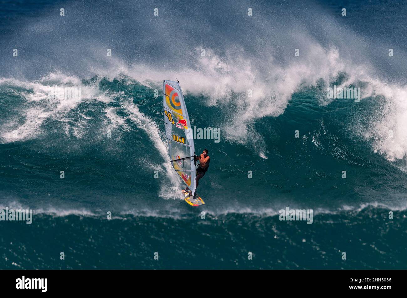 Windsurfer sailing the big waves at Ho'okipa Beach, Maui, Hawaii, USA ...