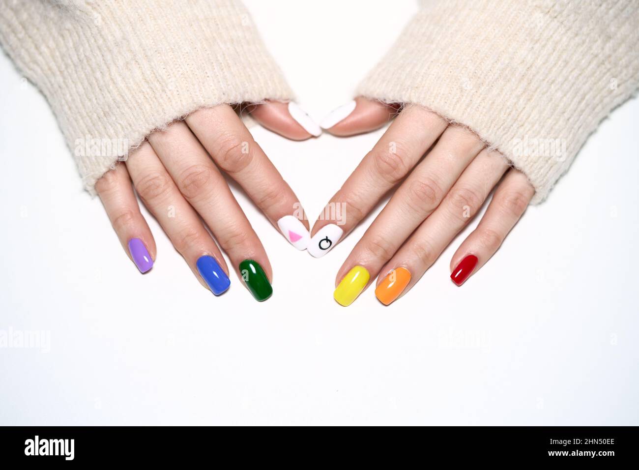 Hands With Lgbt Rainbow Flag And Rose Triangle Manicure Symbol Of