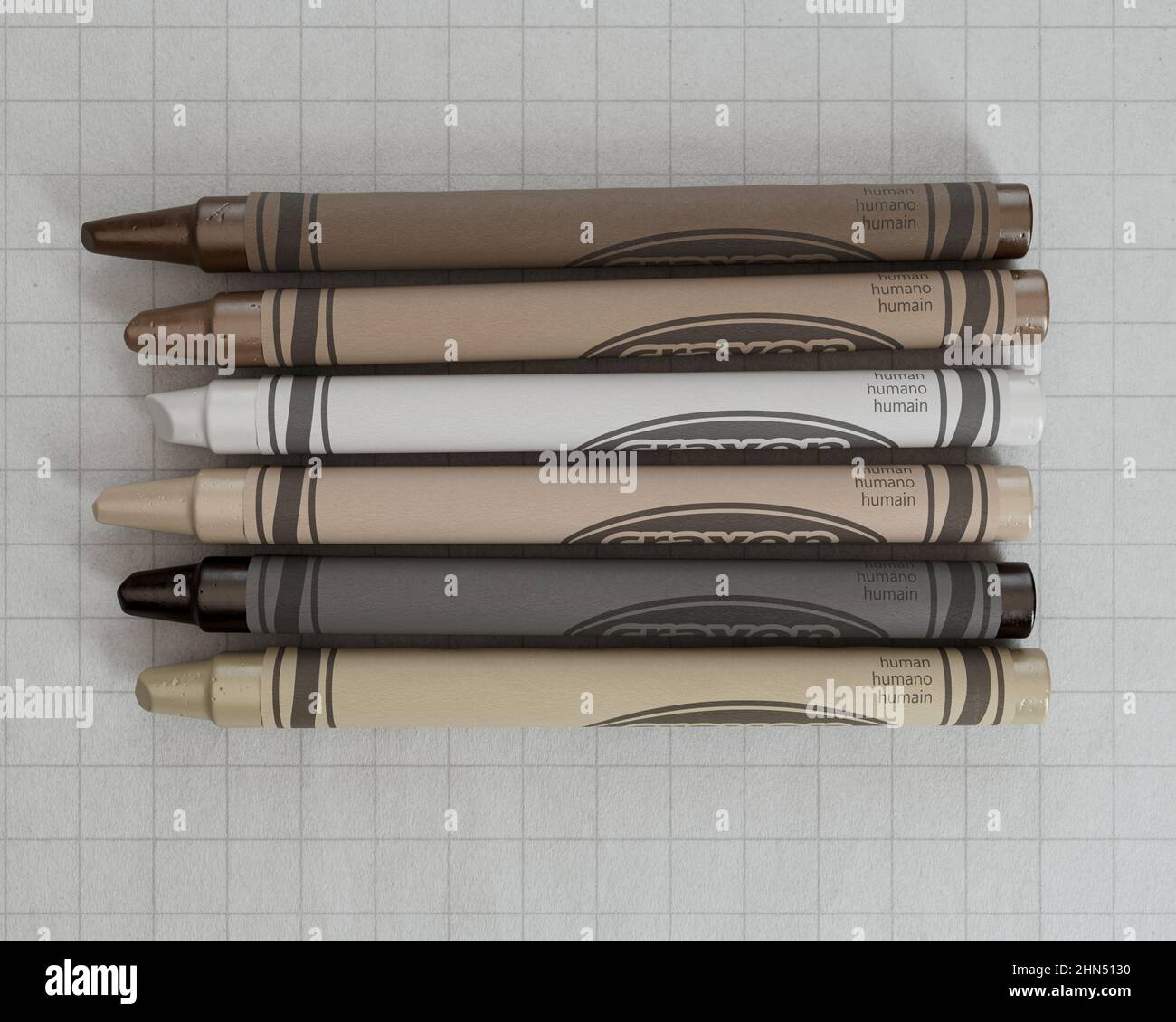 A concept showing childrens wax crayons in various color shades of skin ...