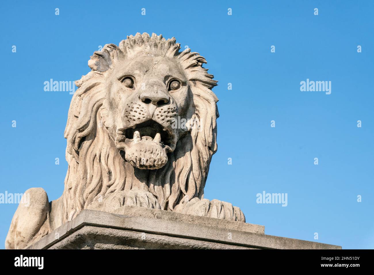 White stone lion statue with open mouth. Photo from bottom to top Stock ...
