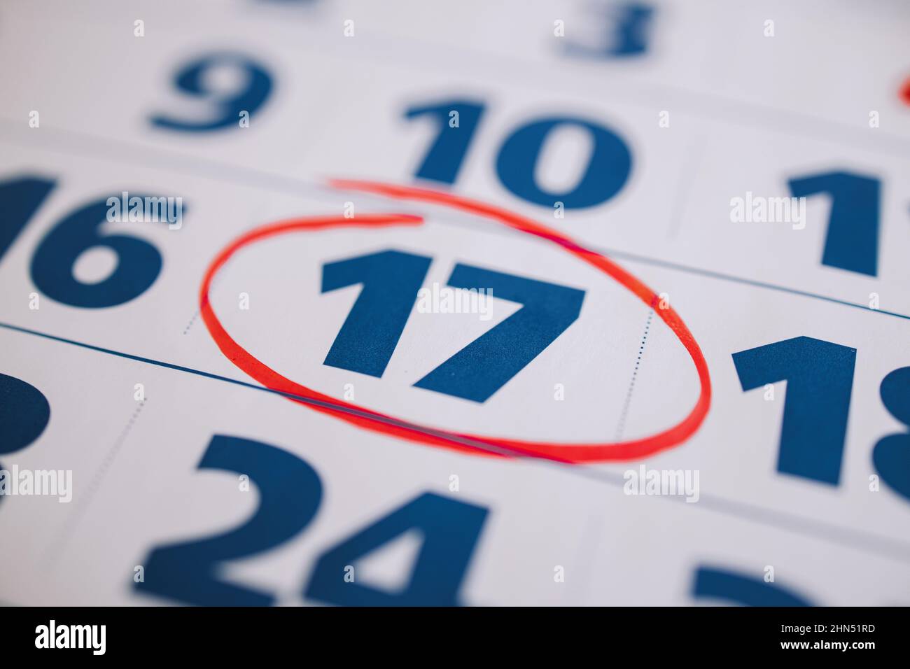 Marking the seventeenth 17 day of a month in the calendar with a red ...