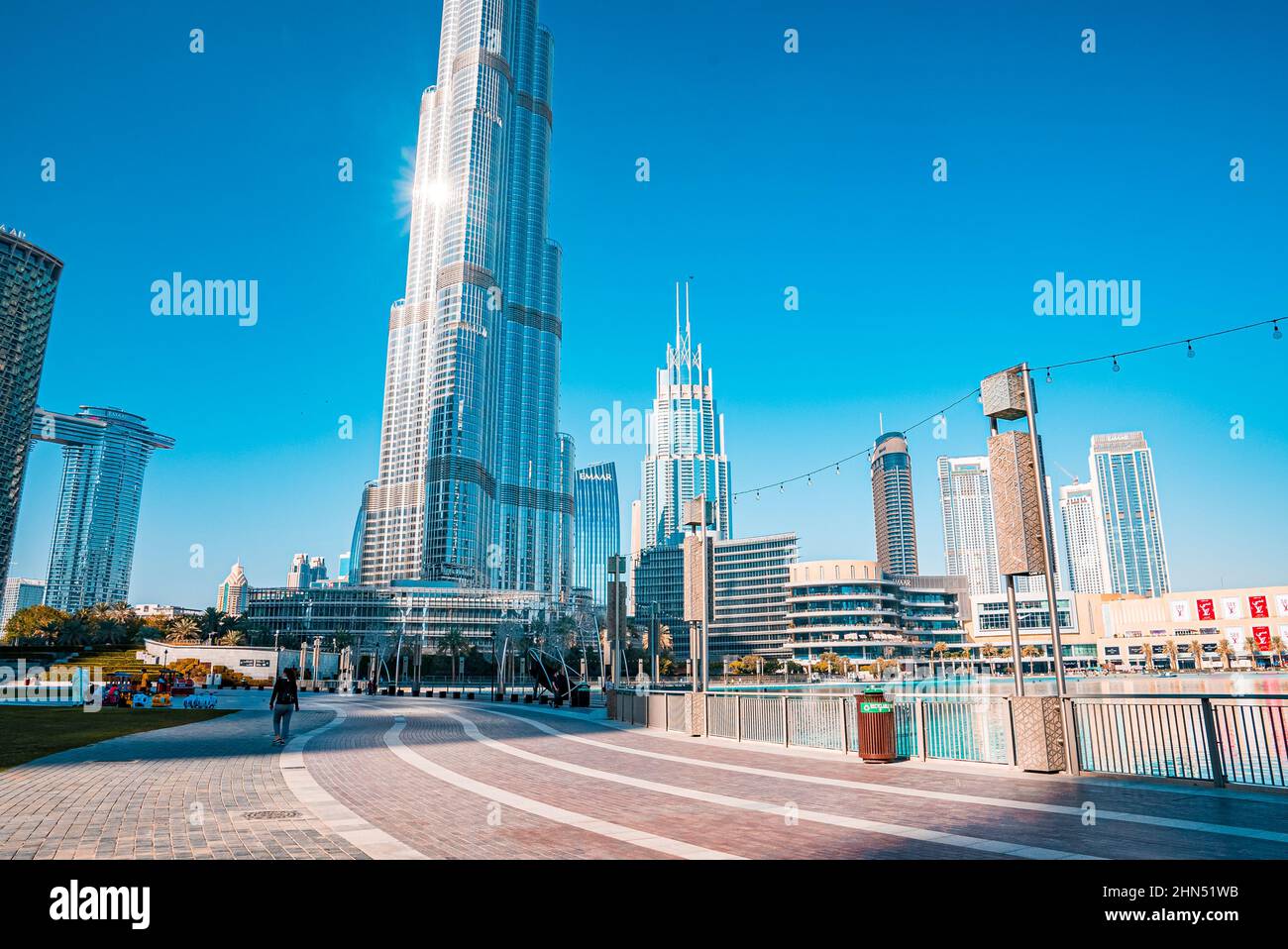 View of Burj Khalifa on a beautiful day with sun reflection by the ...