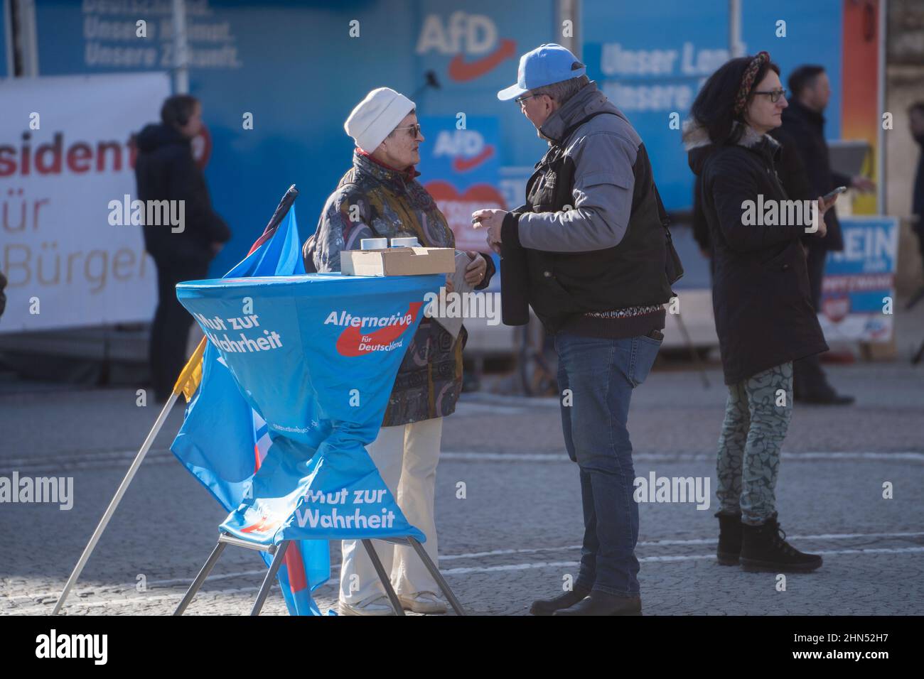 Munich, Germany. 13th Feb, 2022. Participants talking at afd table. On ...
