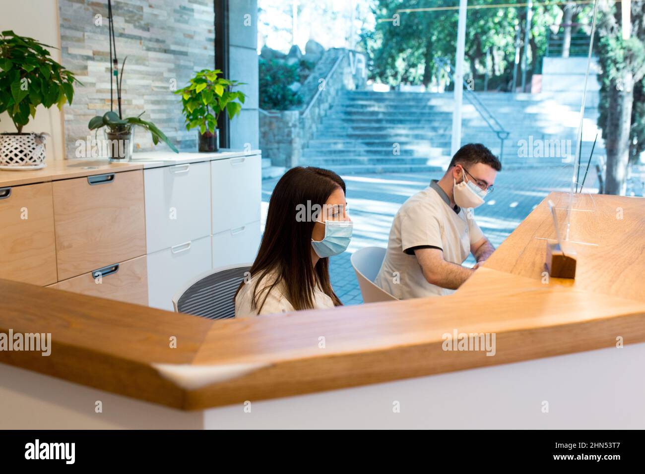 Physical distancing masks hi-res stock photography and images - Alamy