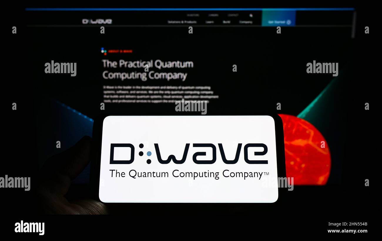 Person holding mobile phone with logo of Canadian hardware company D ...