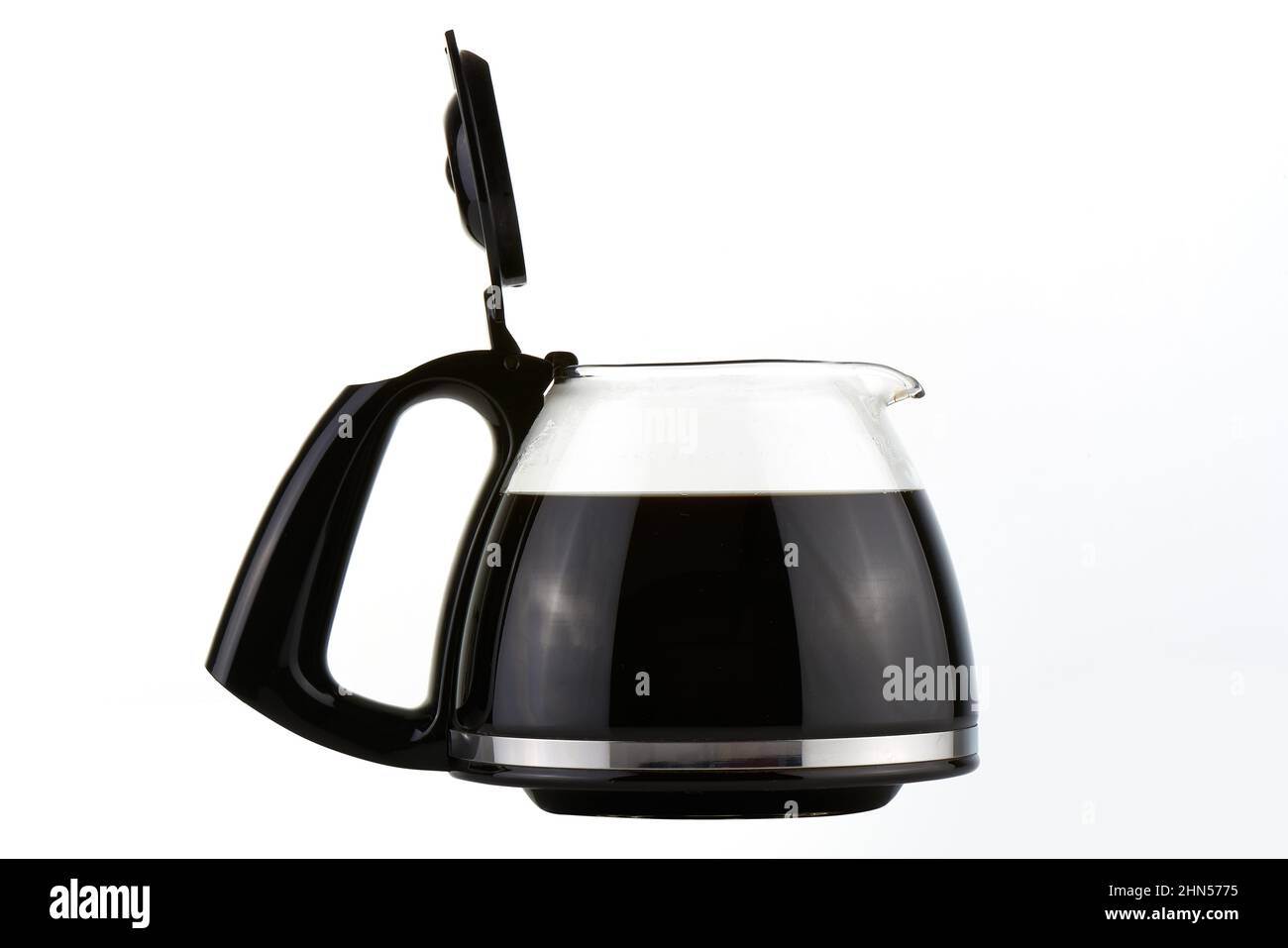 a filled coffee pot opened isolated against a white background Stock ...
