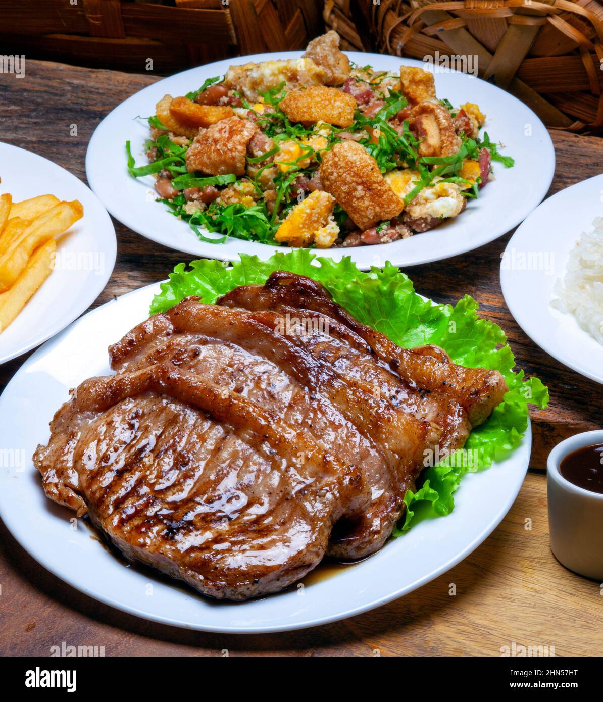 Picanha with tropeiro beans, rice and potatoes Stock Photo - Alamy