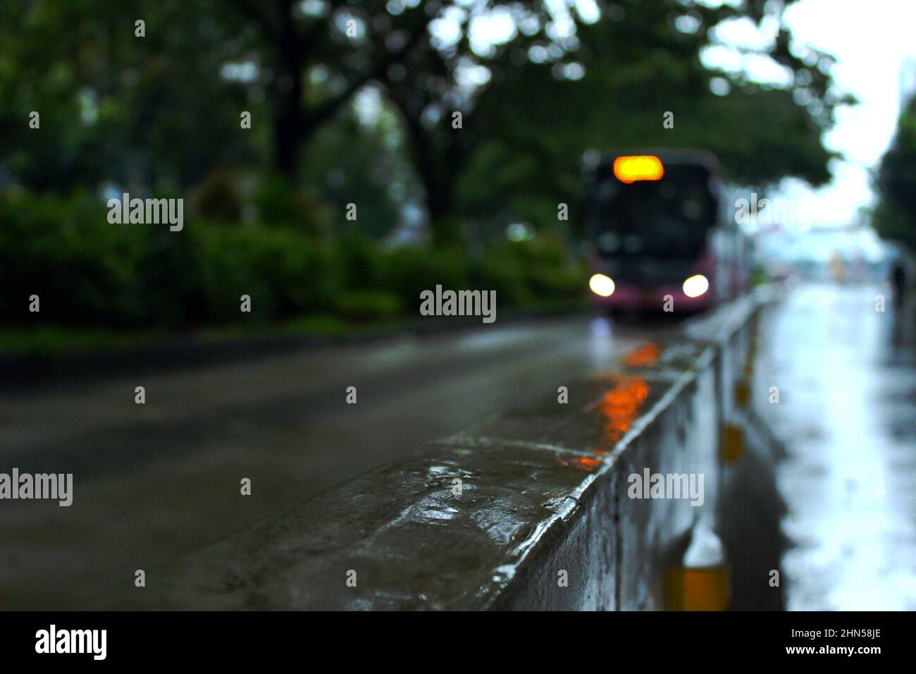 abstract defocused background from a rainy bus road Stock Photo - Alamy