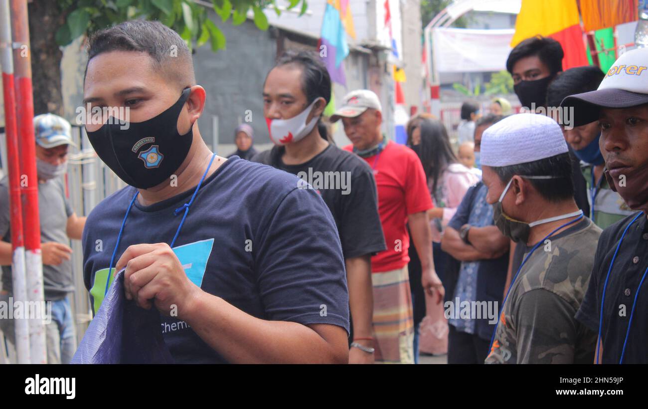 Jakarta, Indonesia - 07-31-2020: people who gather while wearing masks ...