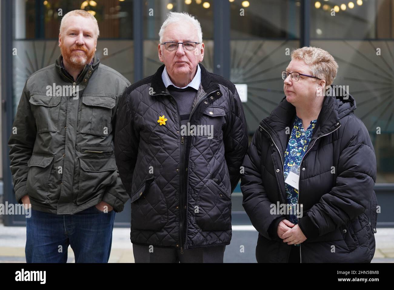 Noel Thomas (centre) with son Edwin and daughter Sian, arrives at the ...