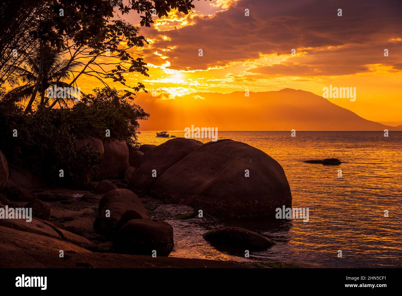 Warm sunset on beach and quiet ocean in Florianopolis, Brazil Stock ...