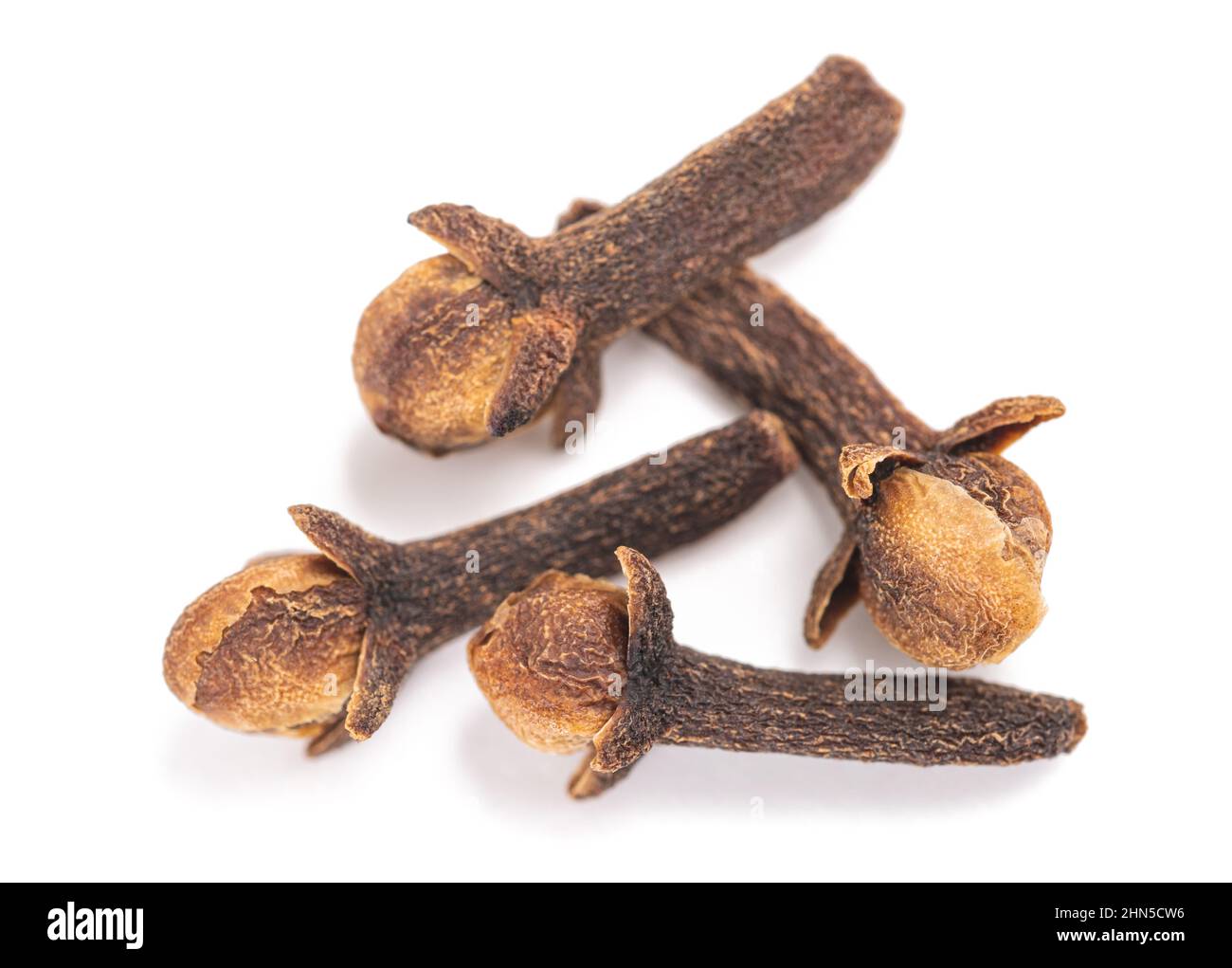 Cloves group isolated on white background Stock Photo - Alamy