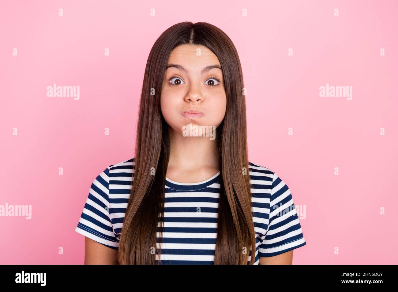 Photo of fooling funky girl dressed striped clothes big eyes bloated ...