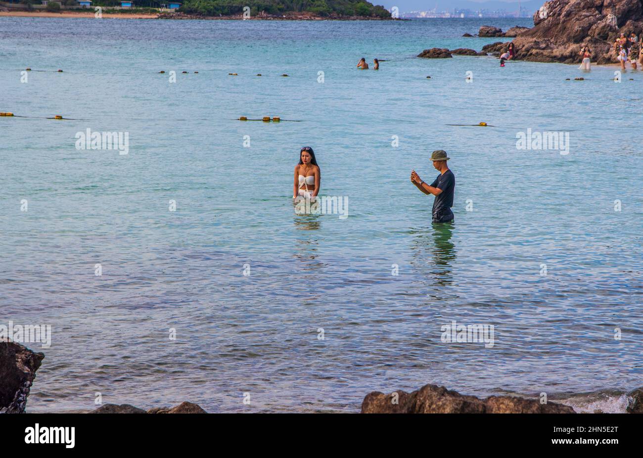 A photoshoot or session on a beach and in the sea Stock Photo - Alamy