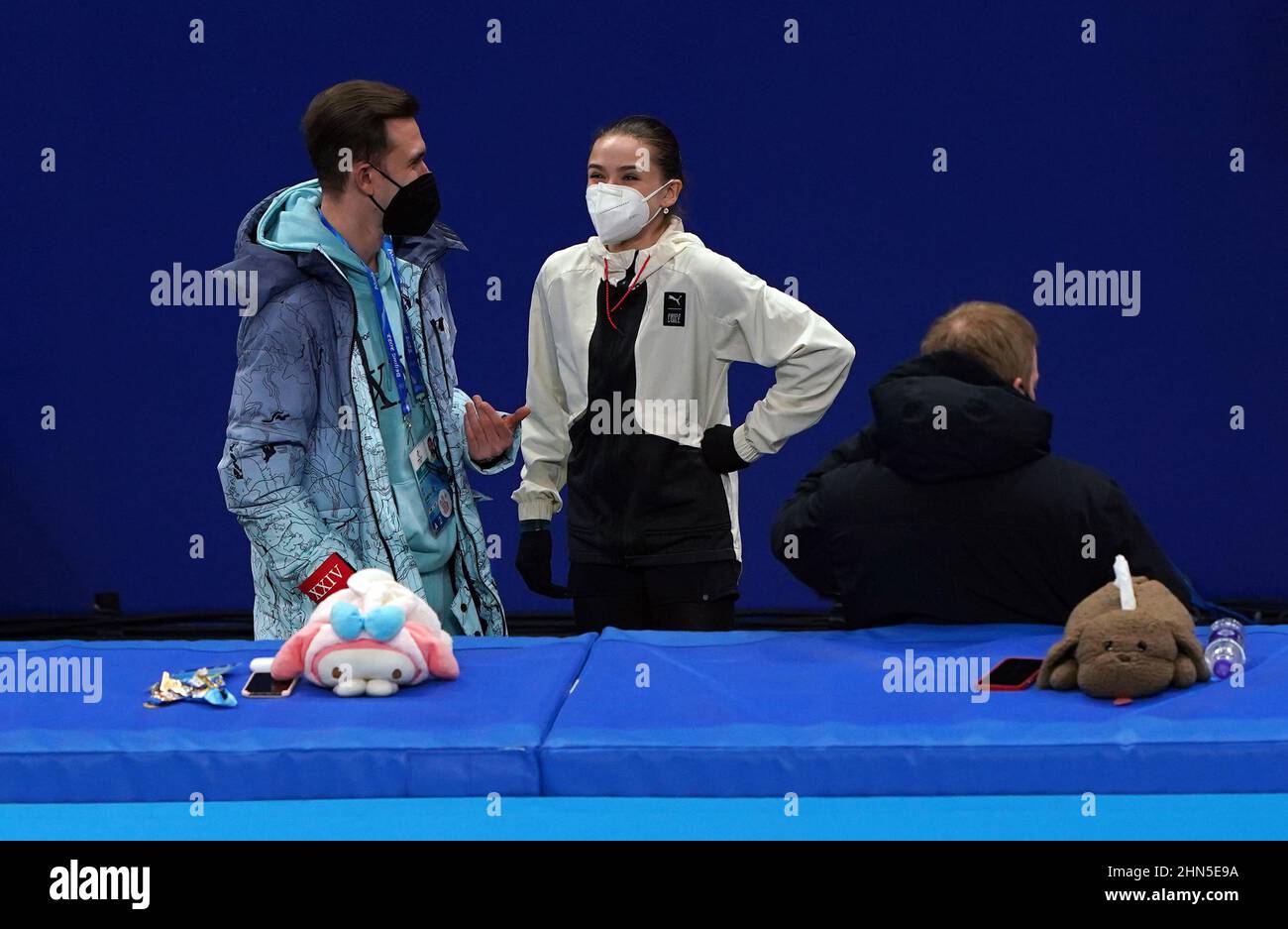 Russian Olympic Committee's Kamila Valieva with her coaching team ...
