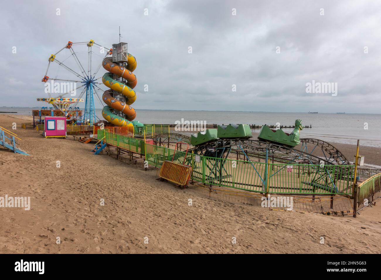Closed funfair rides on the beach at Cleethorpes, Humber Estuary, North ...