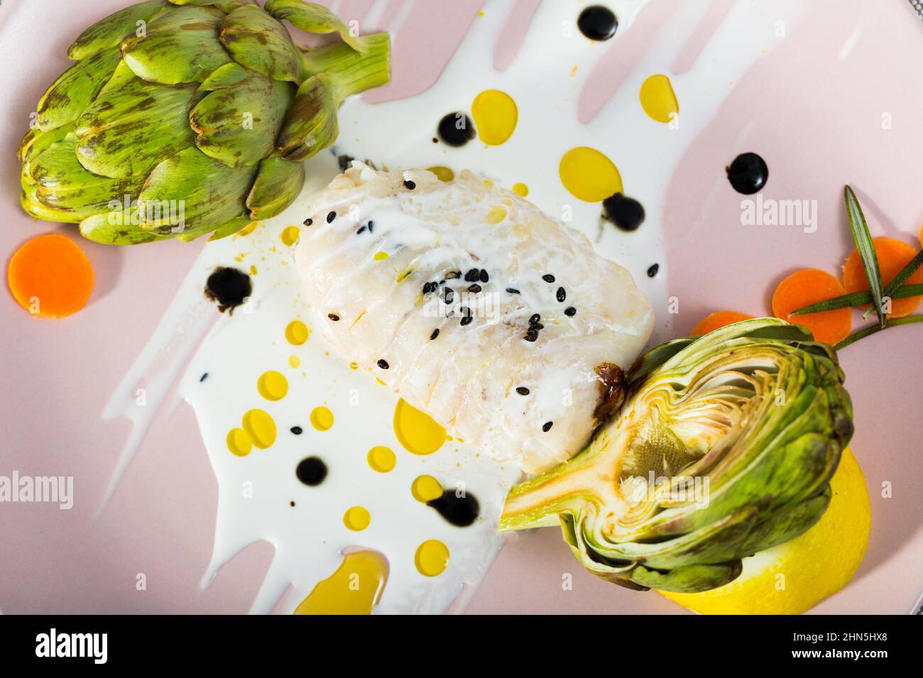 Recipe of stewed hake Provencal Stock Photo - Alamy