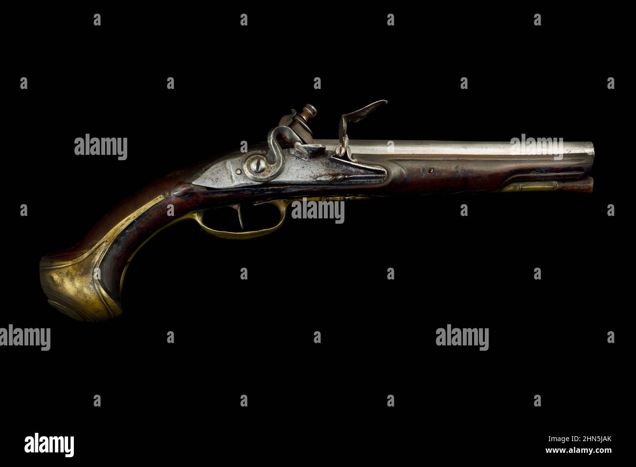 Authentic ancient hand gun isolated on a black background Stock Photo ...