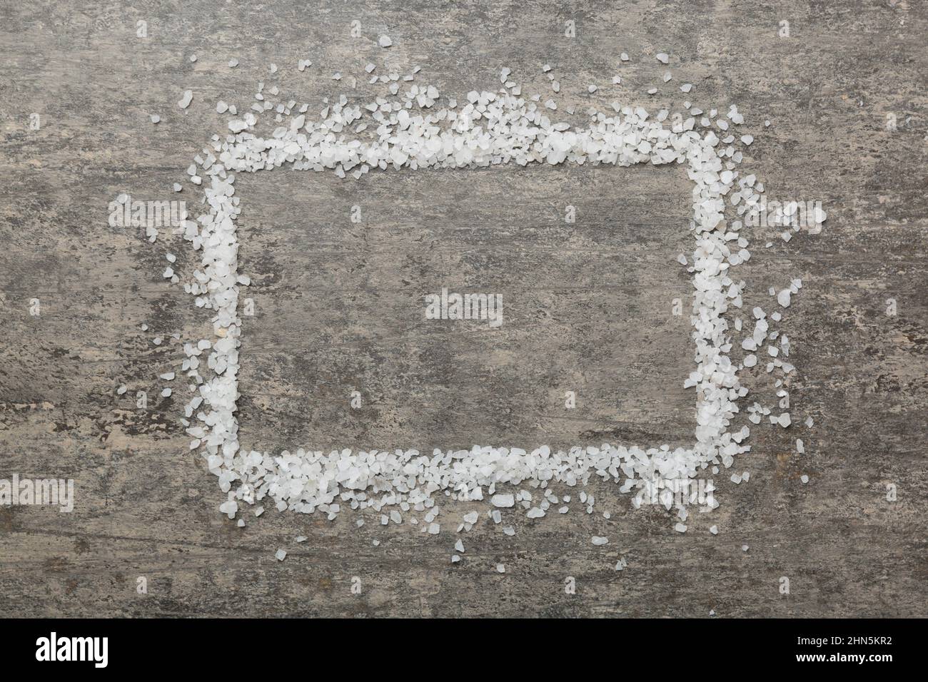 Background from white sea salt. Coarse rock salt texture witth copy ...