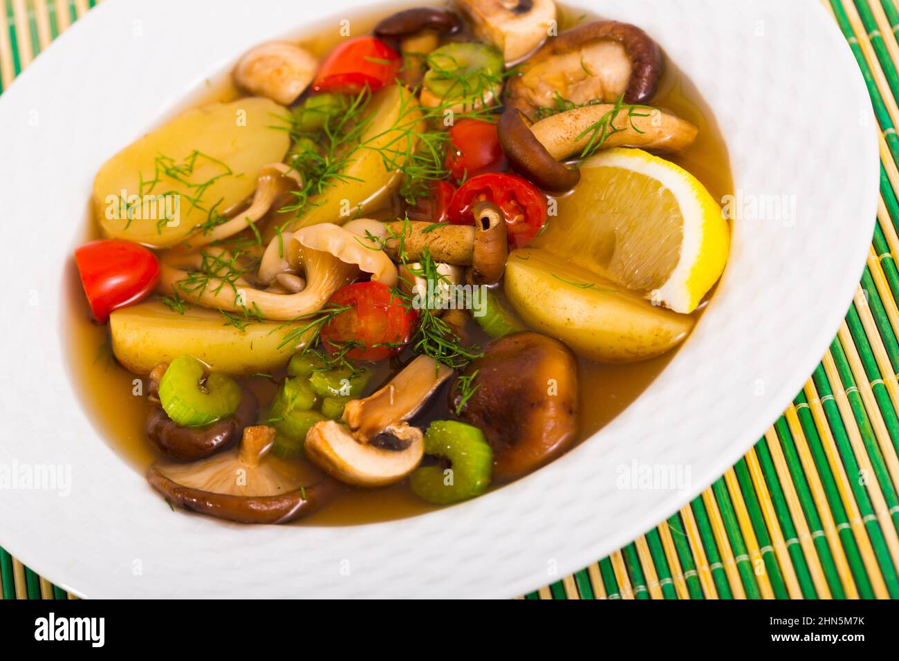 Rustic pottage with mushrooms and vegetables Stock Photo - Alamy