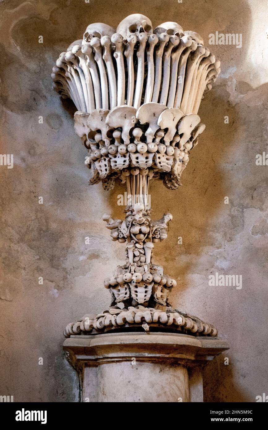 Czech crypt. Skeleton. Czech. Gothic cemetery church in the saddle. A ...