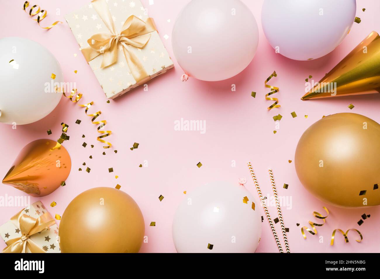 Flat lay party decoration concept on pastel colored background from ...