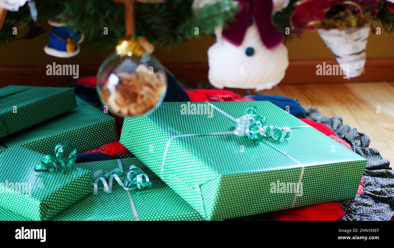 Presents beneath christmas tree hi-res stock photography and images - Alamy