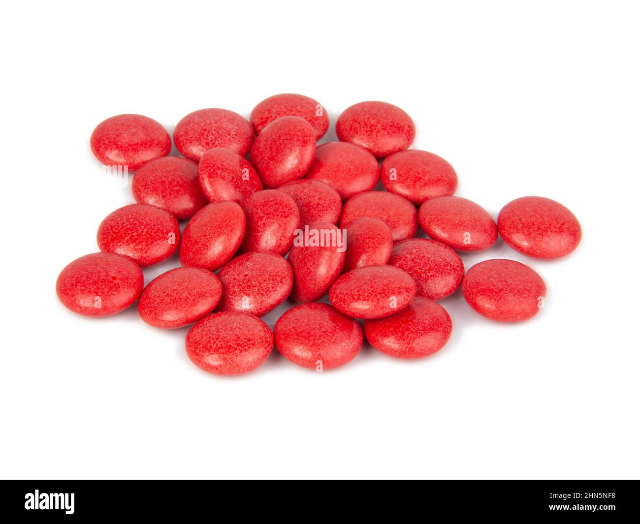 Red dragee chocolate glazed isolated on the white background Stock ...