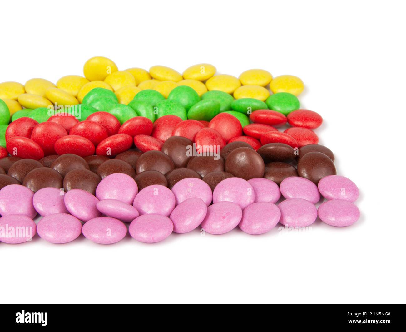 Multicolor dragee drops chocolate glazed isolated on the white ...