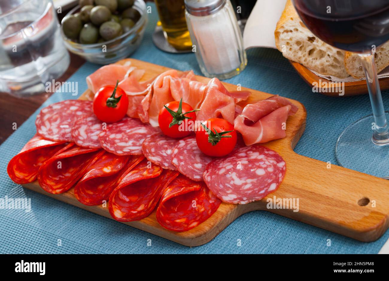 Coldcuts of Spanish cured jamon and sausages Stock Photo - Alamy