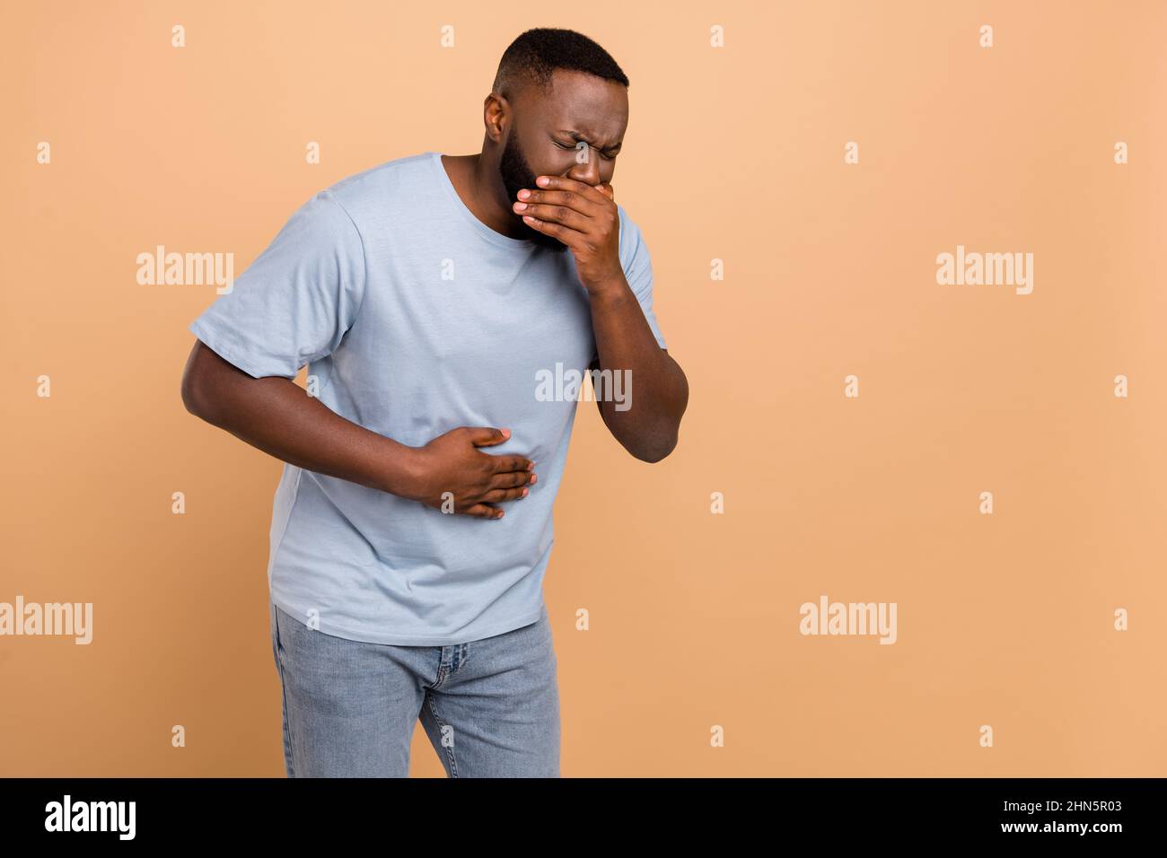 Portrait of attractive sick guy feeling bad nausea coughing isolated ...