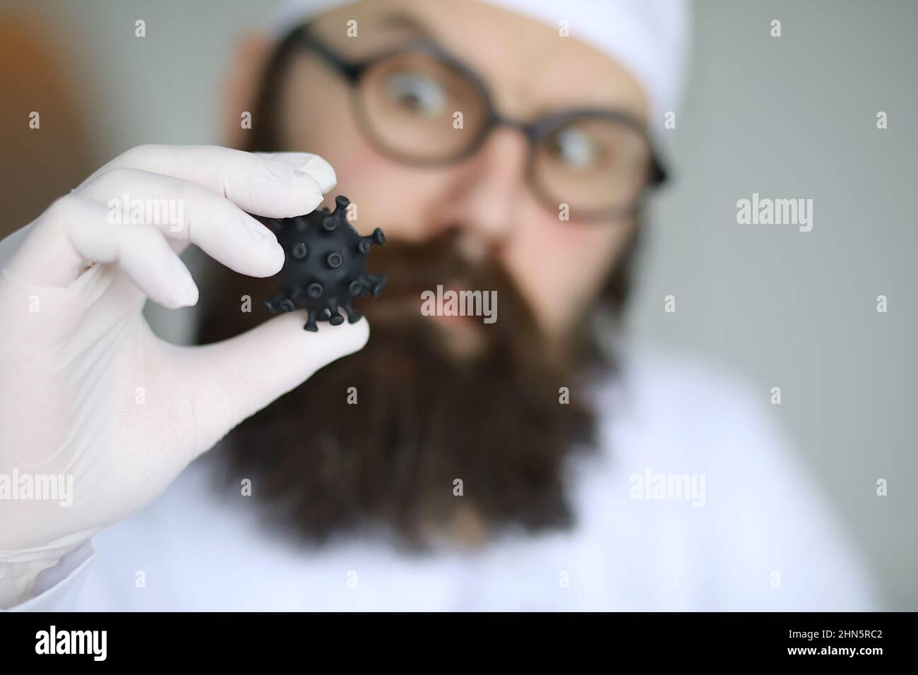 Doctor crazy. Mad beard scientist conducts experiments in a scientific ...