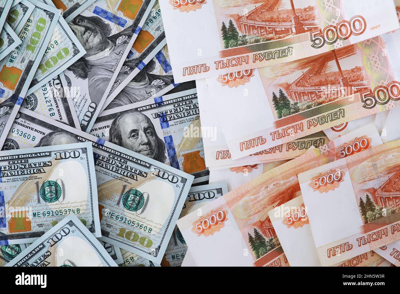Cash money in a large pile as a finance background. Paper money close ...