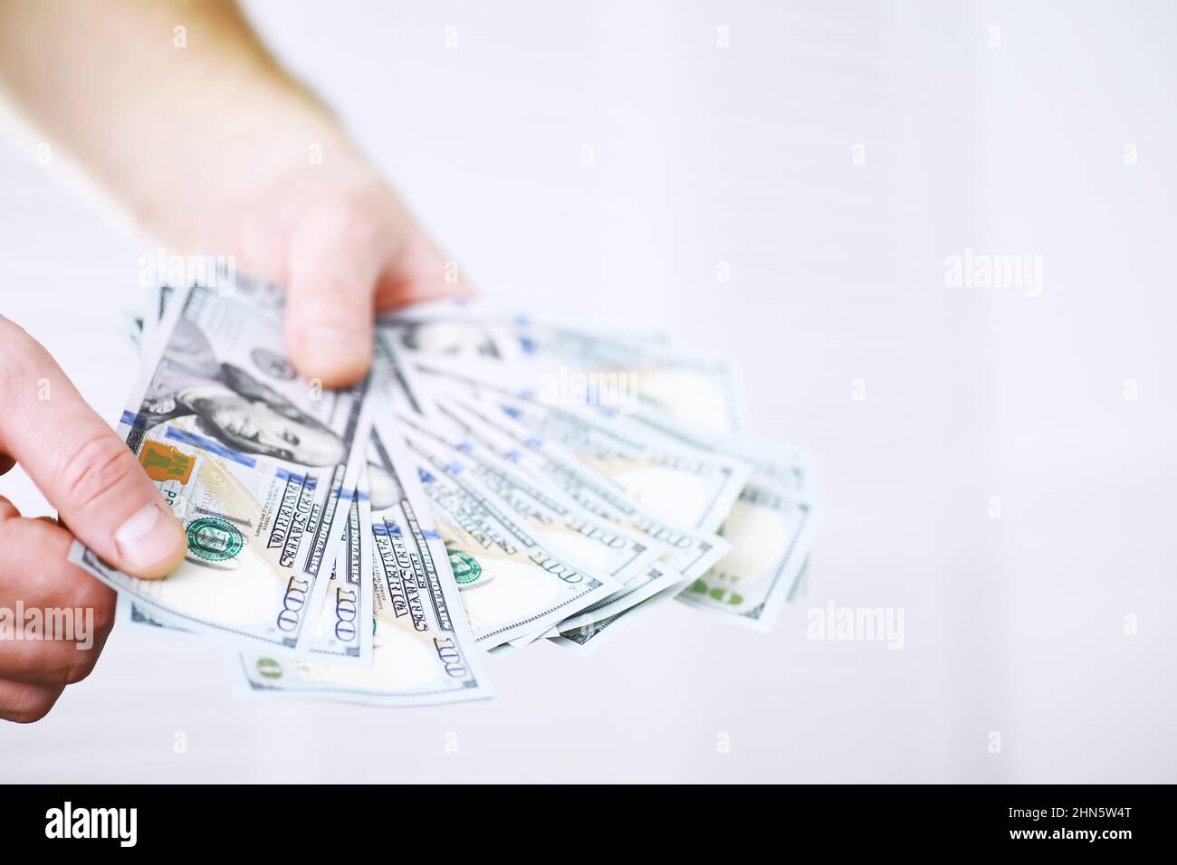 Cash money in a large pile as a finance background. Paper money close ...