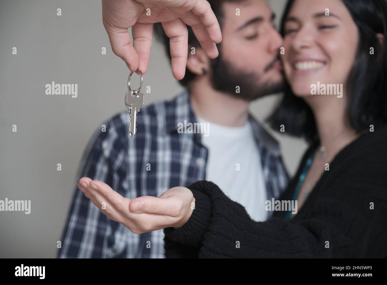 Couple receiving house keys hi-res stock photography and images - Alamy