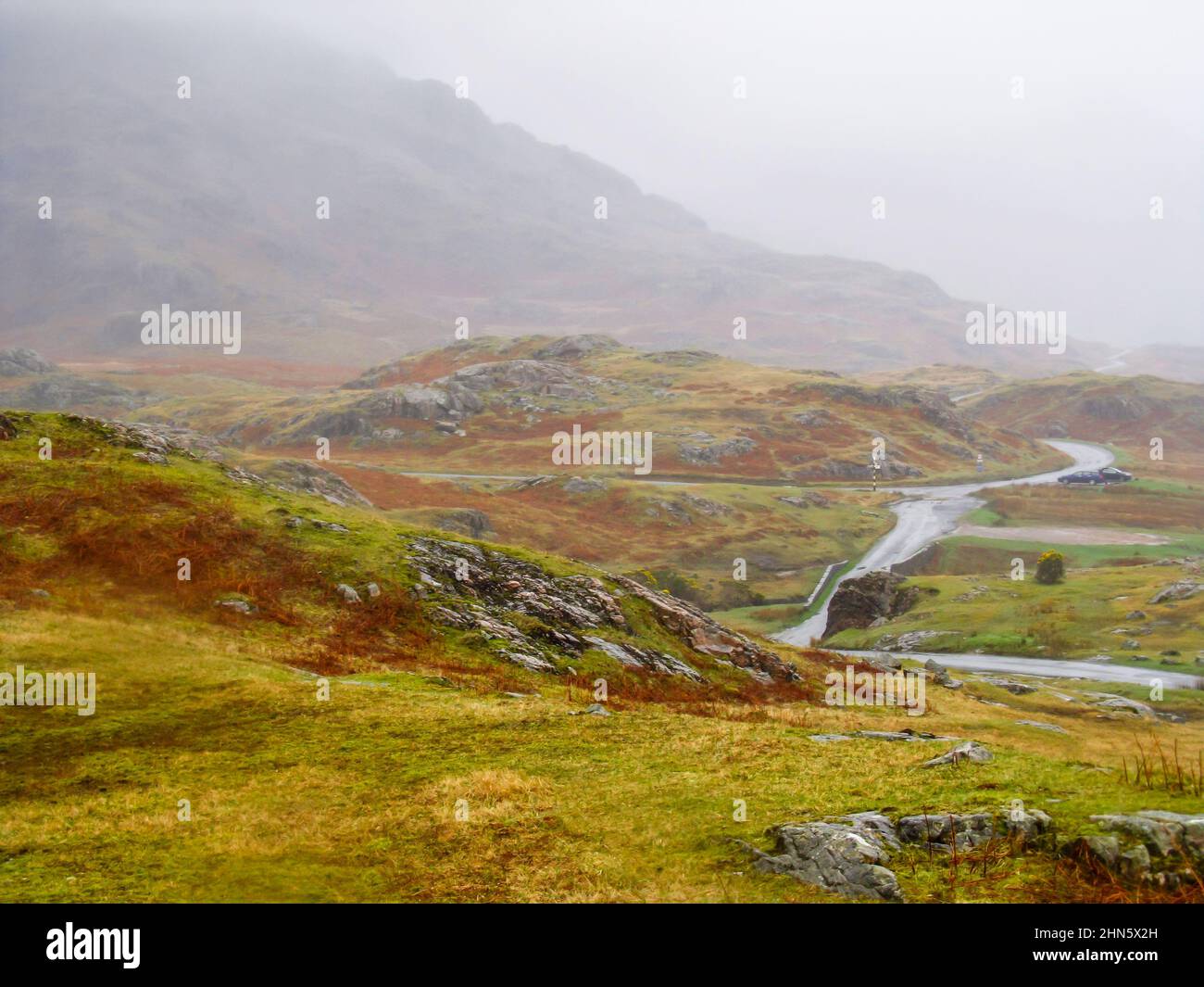 A road winding through the Screes in the Wasdale Valley, Lake District ...