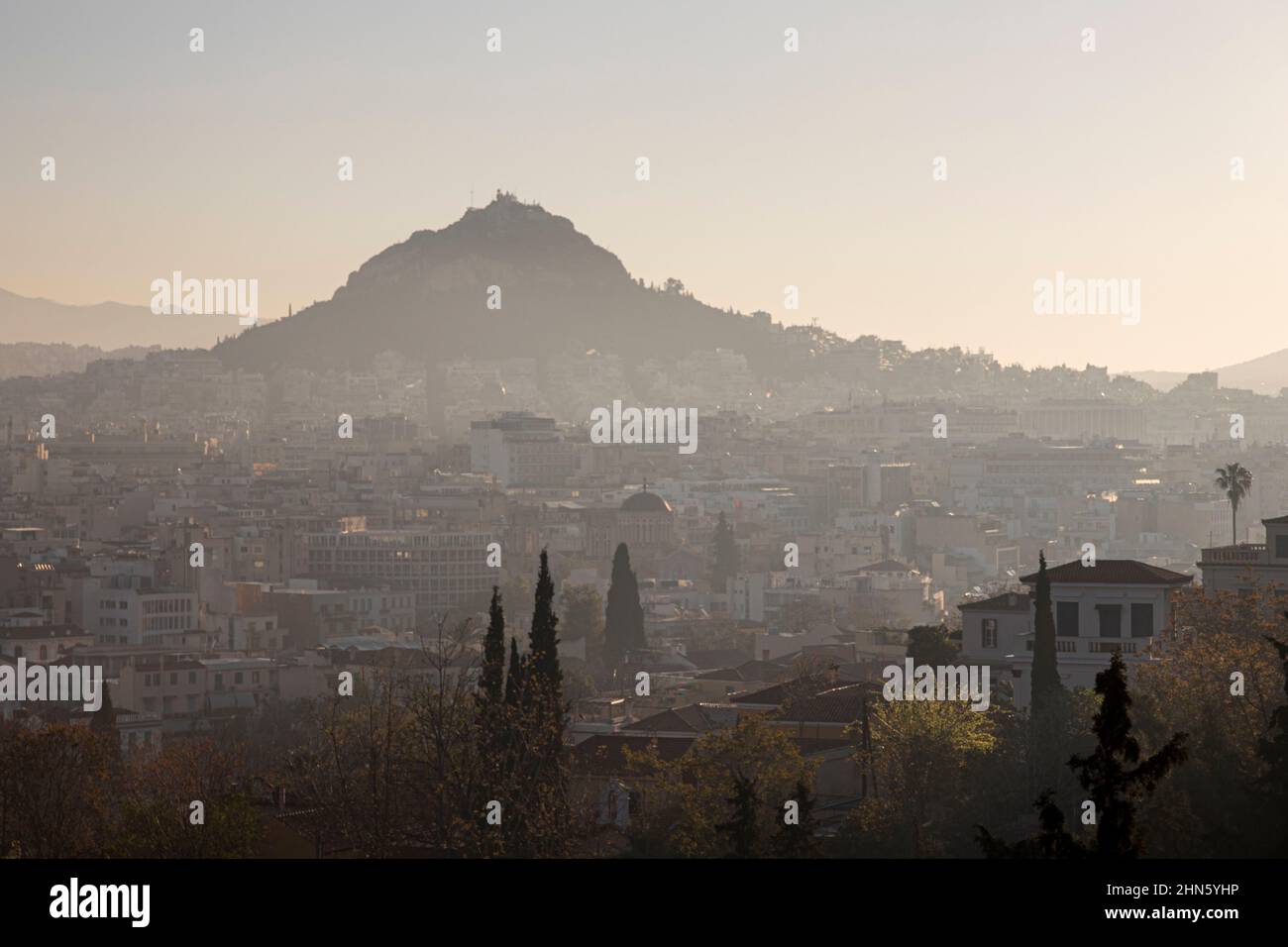 Athens, Greece. Views of the city at sunrise from the Acropolis, with ...