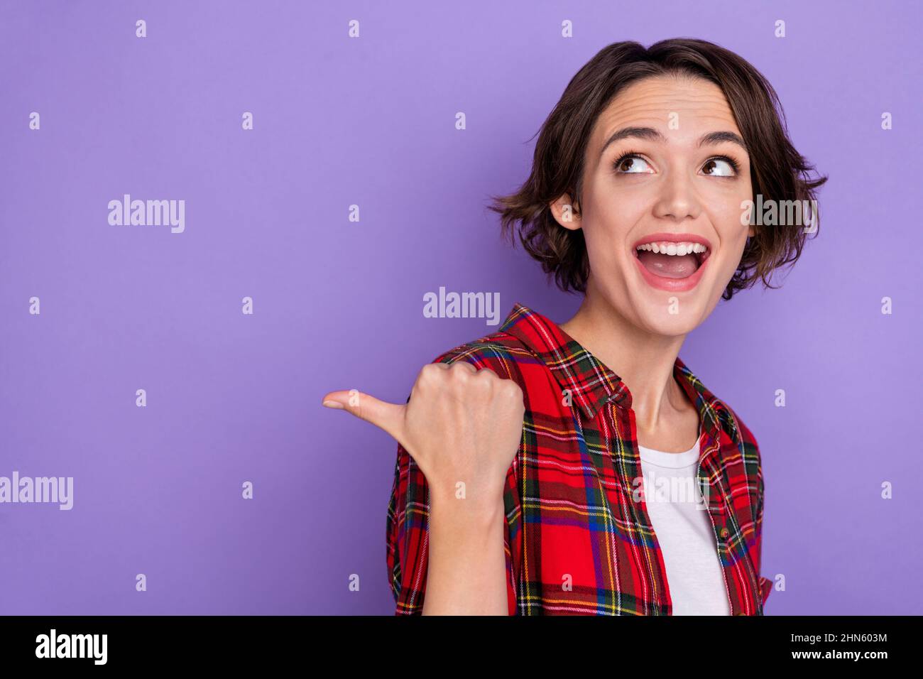 Photo Of Impressed Millennial Bob Hairdo Lady Look Promo Wear Plaid