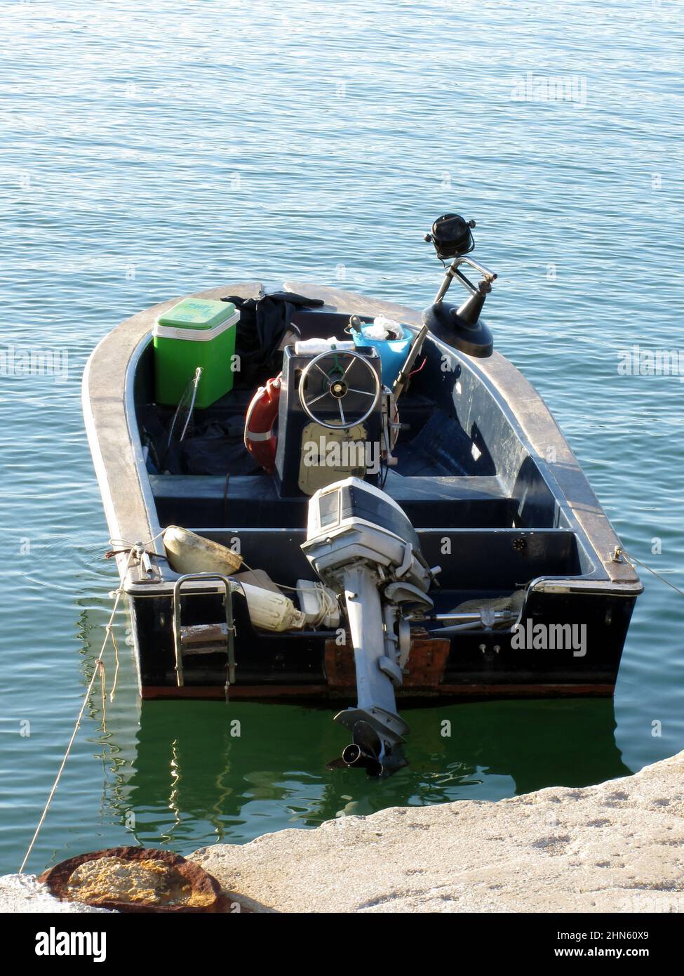 Little italian fishing boat on the sea Stock Photo - Alamy