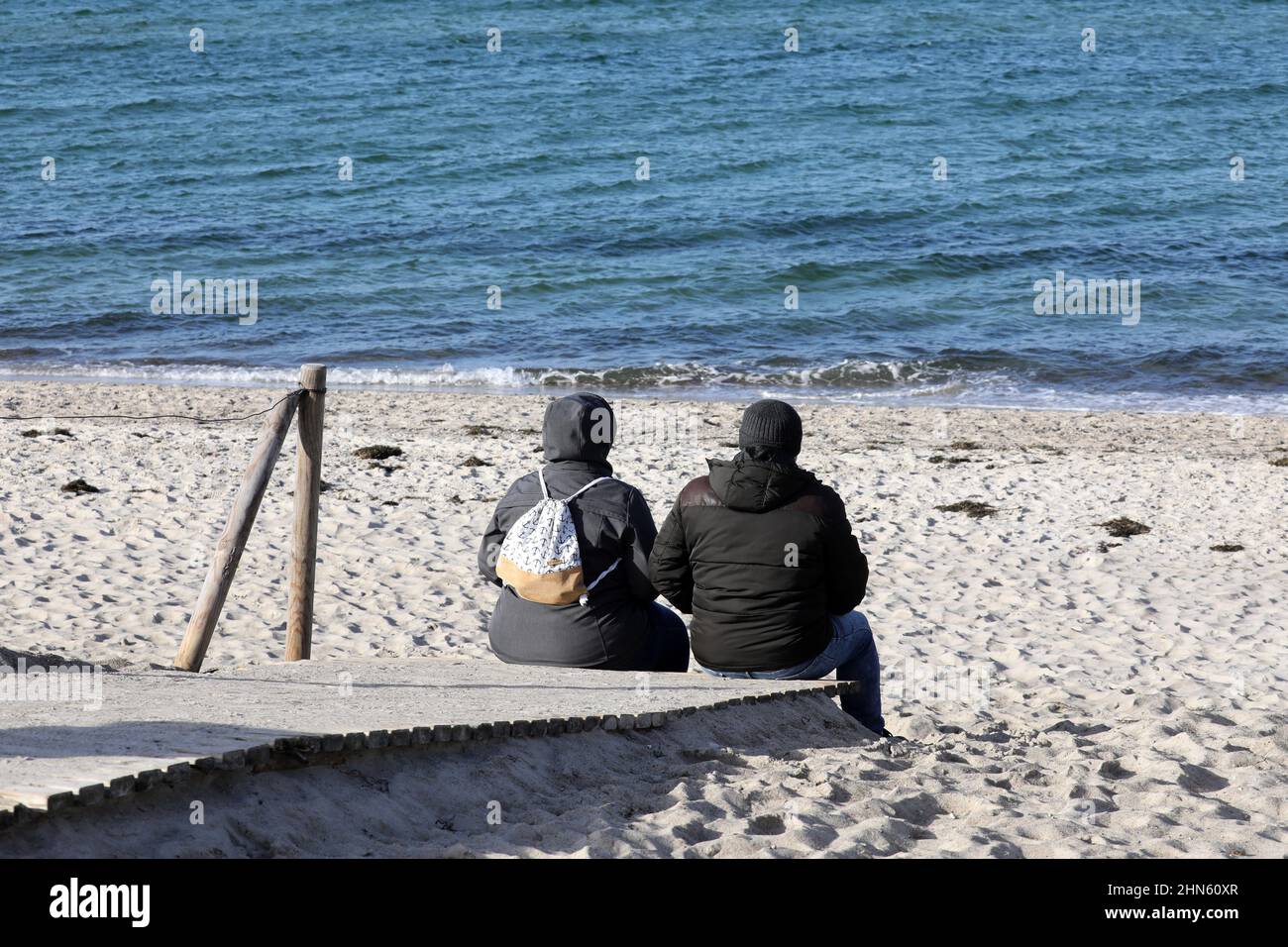 Rerik, Germany. 14th Feb, 2022. Beachgoers enjoy the sunny weather on ...