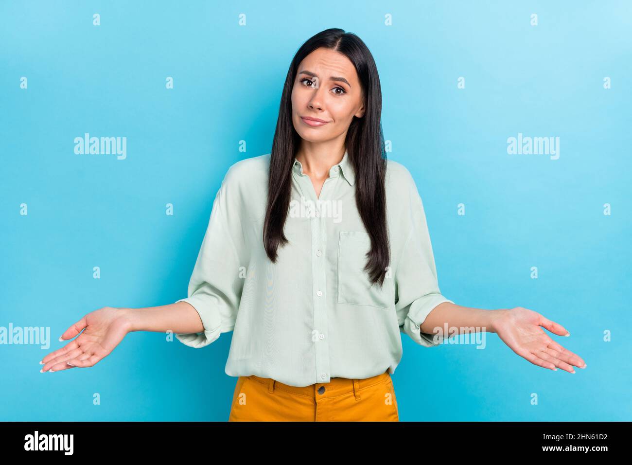 Photo of young attractive lady shrug shoulders puzzled trouble ...