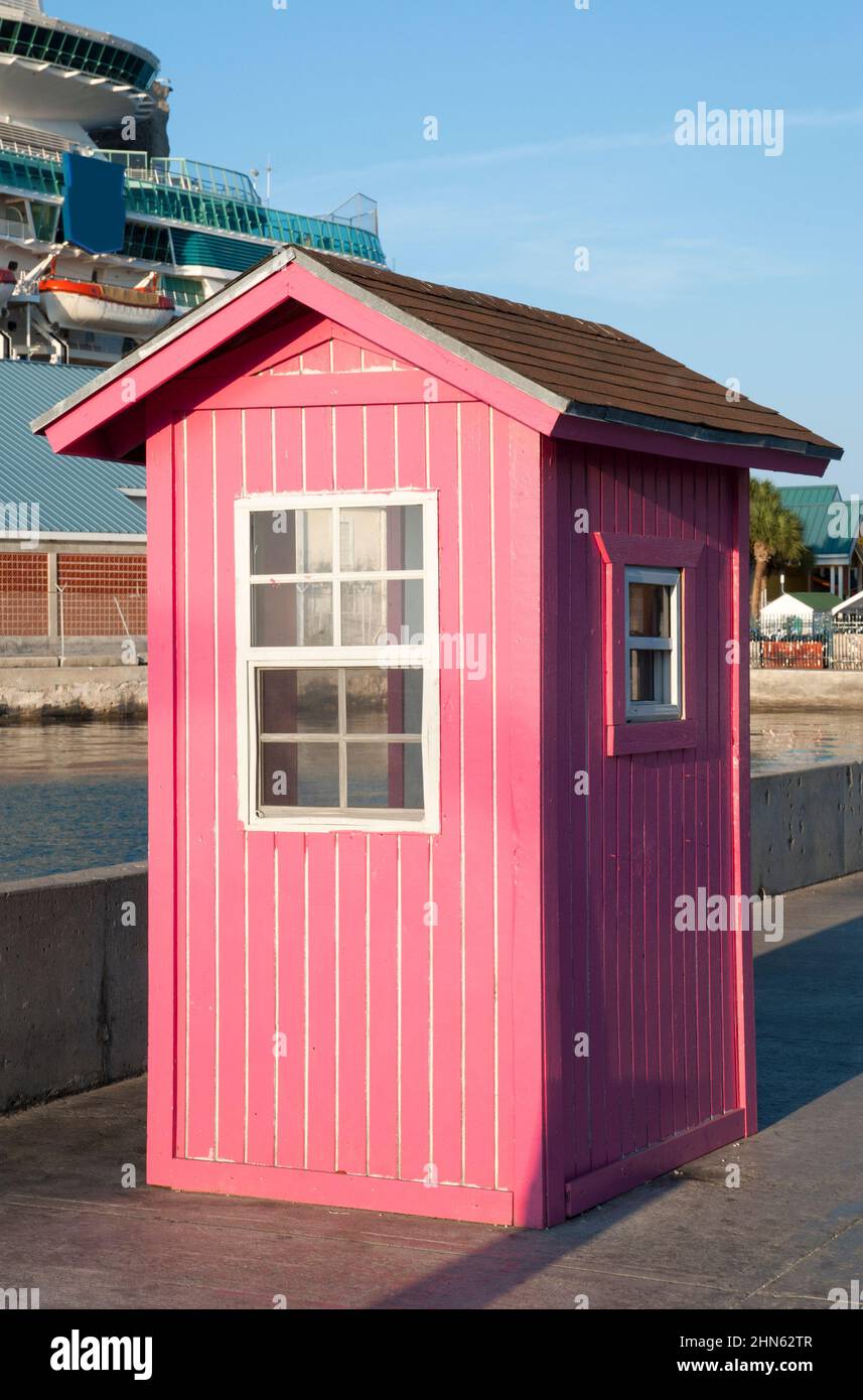 The view of a red wooden booth with a cruise ship in a background in ...