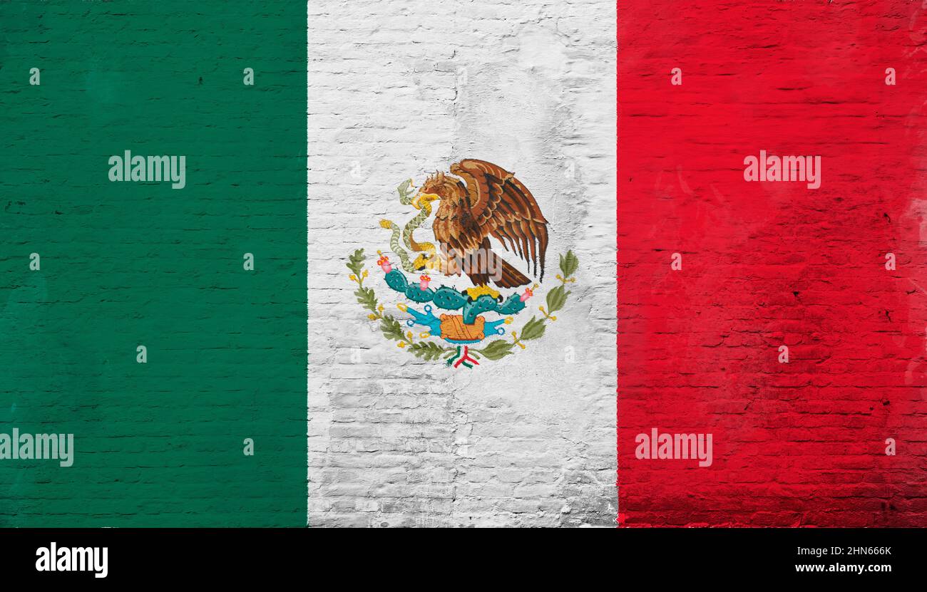 Full frame photo of a weathered flag of Mexico painted on a plastered ...