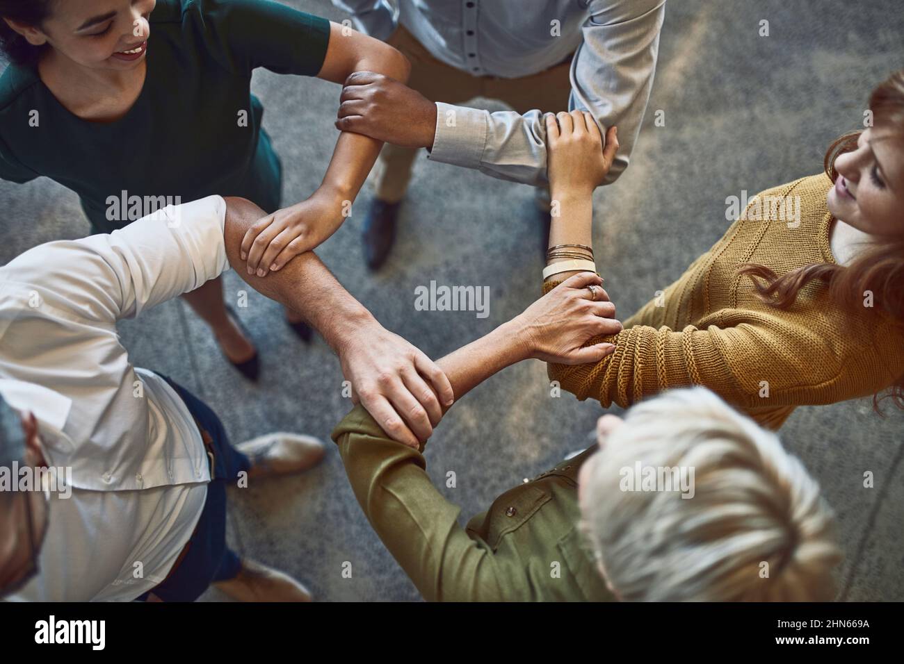 Behind a successful business is a strong team. High angle shot of a ...