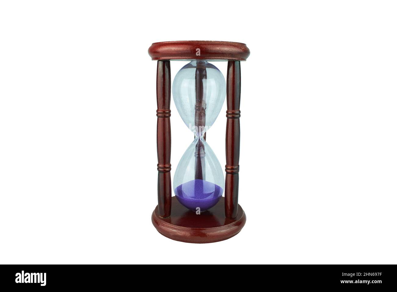 Wooden hourglass with violet sand isolated on white background Stock ...